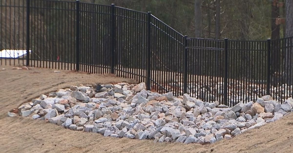 Raleigh neighbors fear flooding from new development's spillway :: WRAL.com