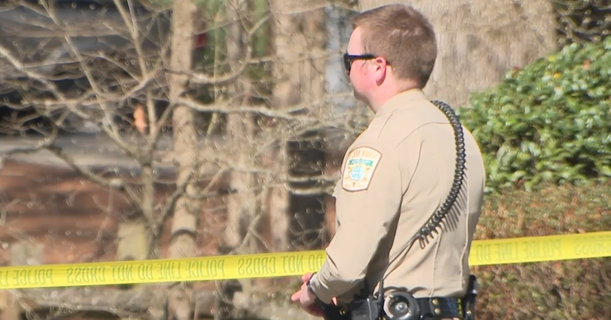 Police: Ax-wielding man charged at officers before being shot to death ...