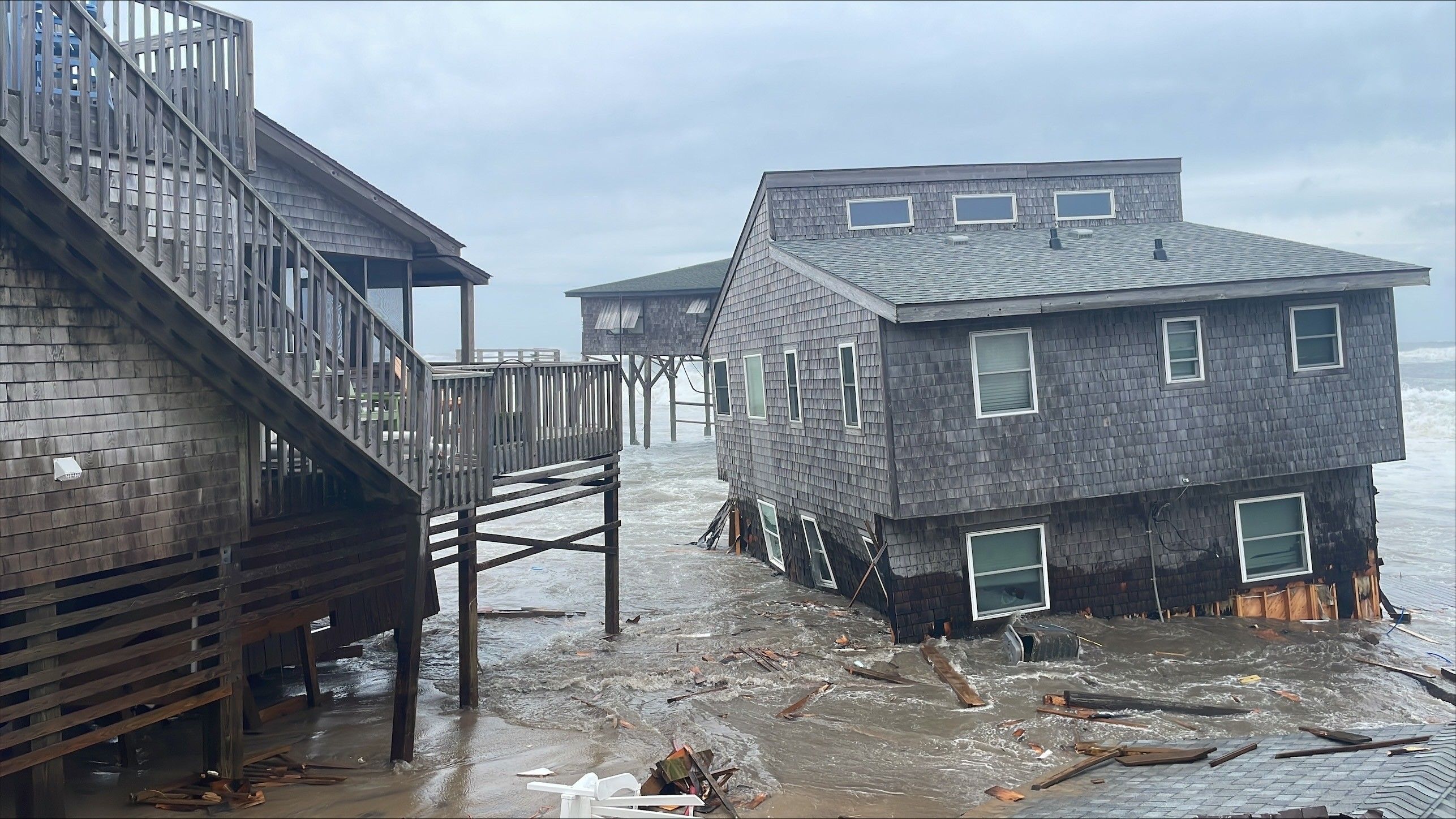 Six houses fall into sea in 24 hours in Outer Banks as hurricanes pass ...