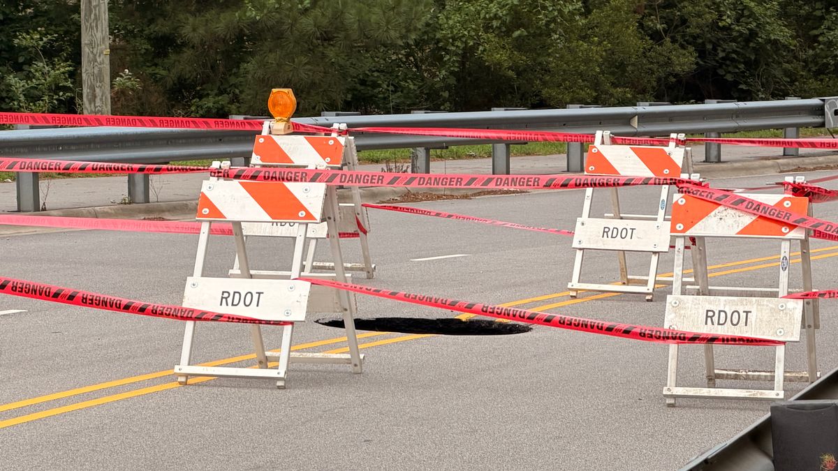 Large hole blocks traffic on Yonkers Road in Raleigh :: WRAL.com