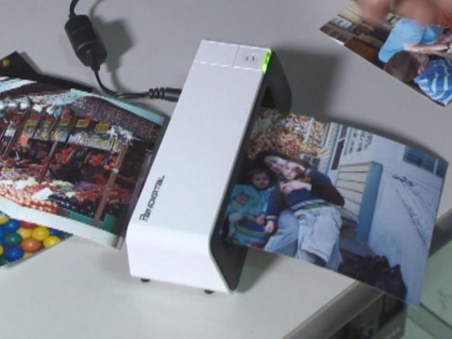 Photo scanners digitize old photographs in seconds