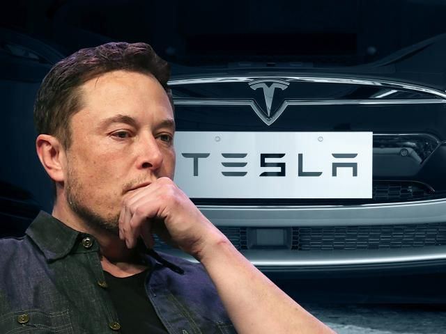 Tesla cuts 9% of staff