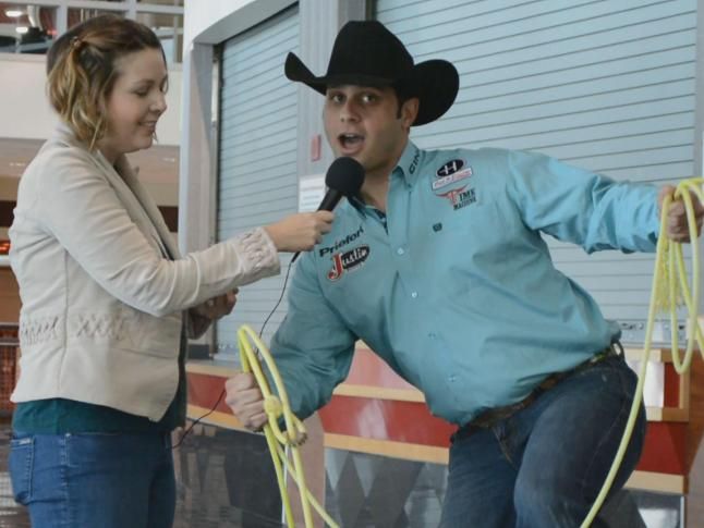Learning the trick ropes with World's Toughest Cowboy announcer