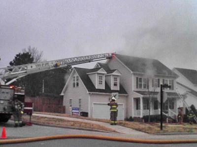 Crews Battle Apex House Fire