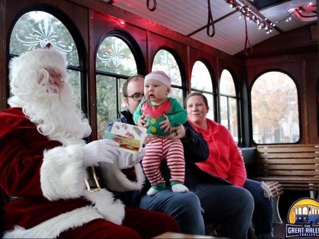 See Santa aboard one of these Raleigh trolley rides
