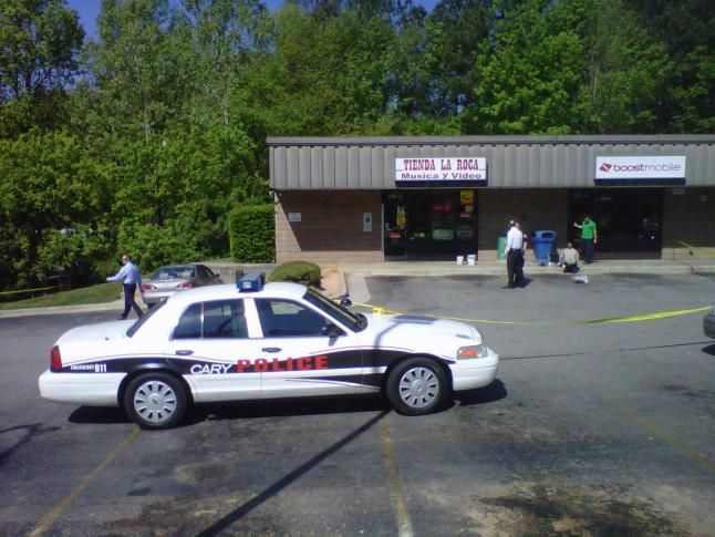 Armed men rob Cary store owner