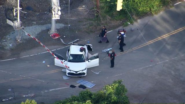 Sky 5 flies over crash near train tracks in Durham