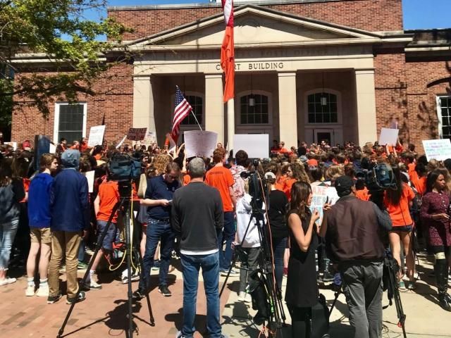 Scared, angry and demanding action: Hundreds walk out of Triangle ...