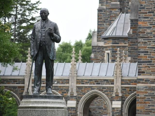 Duke under investigation at time of cutbacks, financial strife