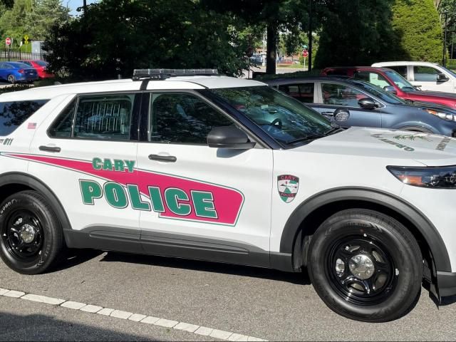 Cary Police Department unveils colorful SUVs for school resource officers