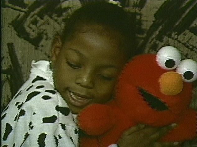 Girl Learns Giving Better Than Getting, Even With Elmo