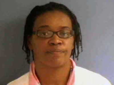 Teacher, accused of shooting college student, suspended