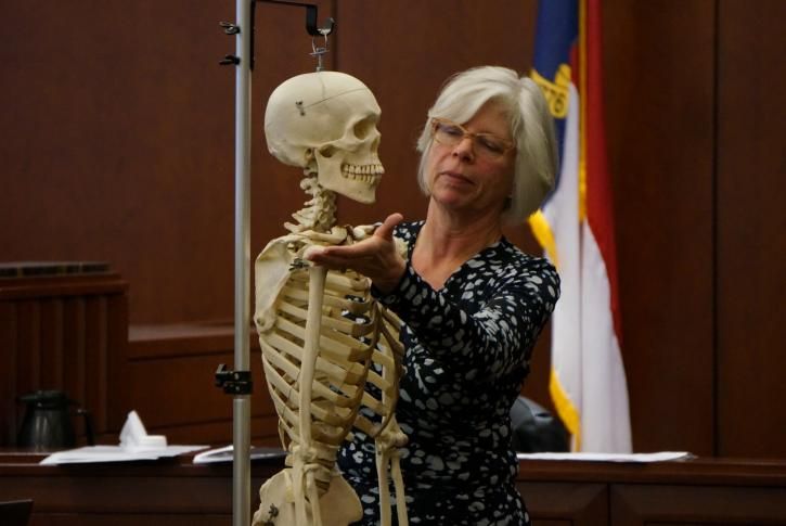 Testimony: Exact cause of Ackerson's violent death uncertain