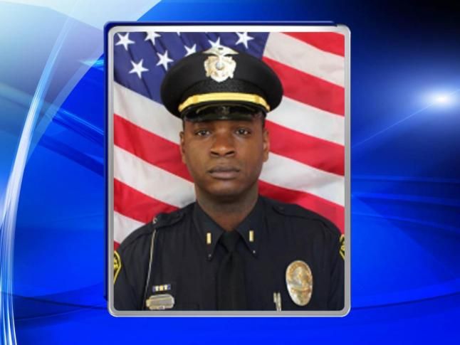 Clinton officer charged with passing stopped school bus