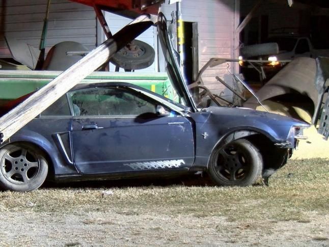 Car crashes into barn, farm equipment in Four Oaks