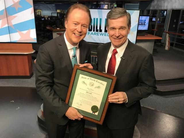 Gov. Cooper presents Bill Leslie with the state's highest honor