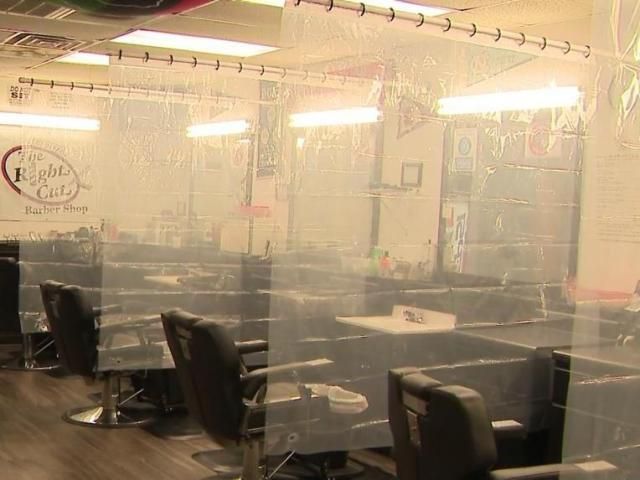 Barbershop installs curtains, will require temperature checks upon ...