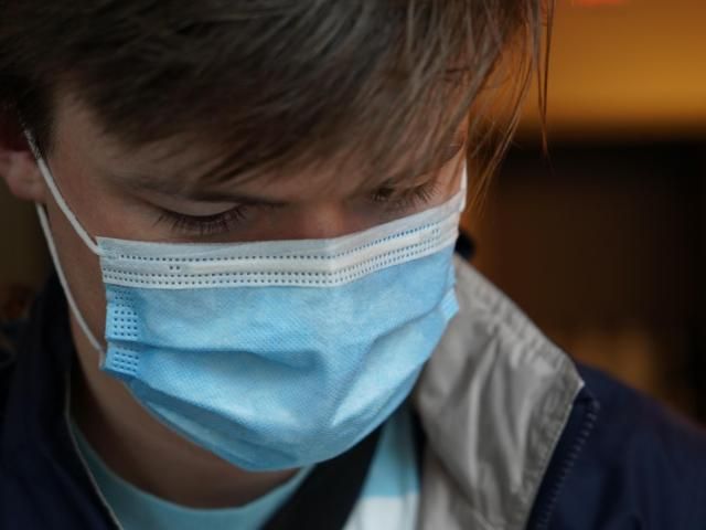 Hospitals limit visitors as flu cases surpass COVID