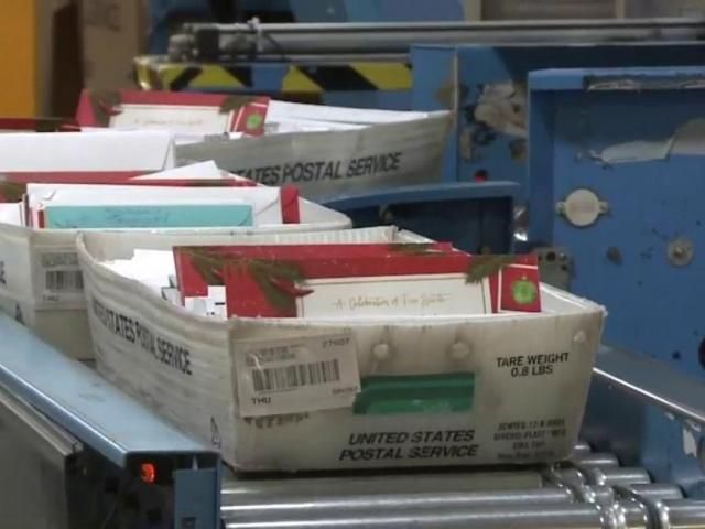US Postal Service processing center prepares for holiday rush with ...