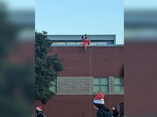 Life-size Elf on the Shelf on roof of Dillard Drive Magnet Middle ...