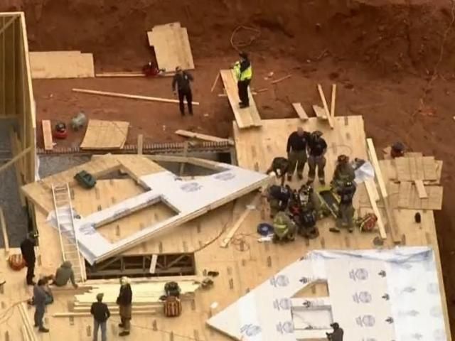 4 people hospitalized after newly built wall weighing nearly 1,000 ...