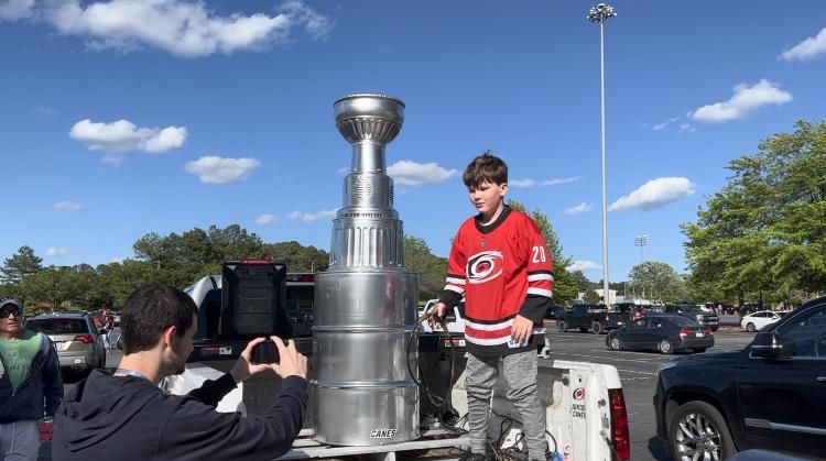 Canes fans show off their game-day traditions in the midst of Playoffs