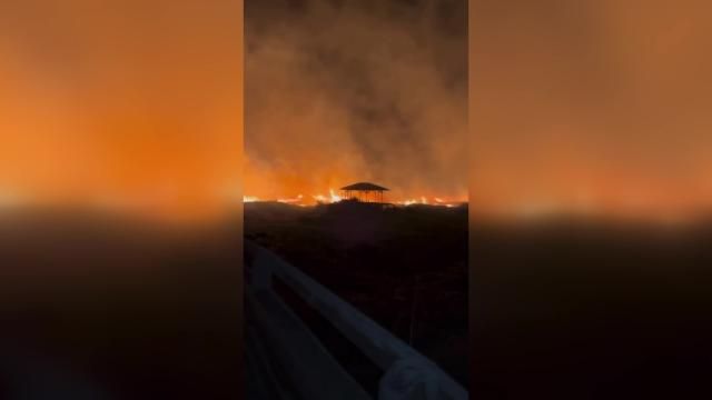Fire burns dunes near condos at Atlantic Beach
