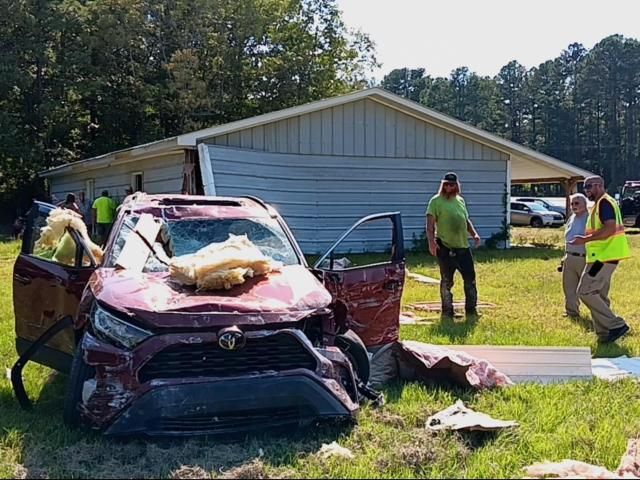 SUV crashes into Moore County home, goes completely through building