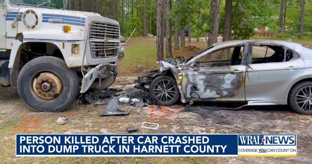 One dead after car hits dump truck and catches fire in Cameron :: WRAL.com