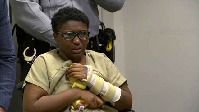 Woman accused of street racing in fatal crash appears shaken in court ...