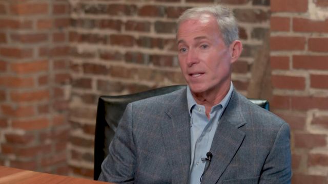 What is John Preyer's legacy at UNC?