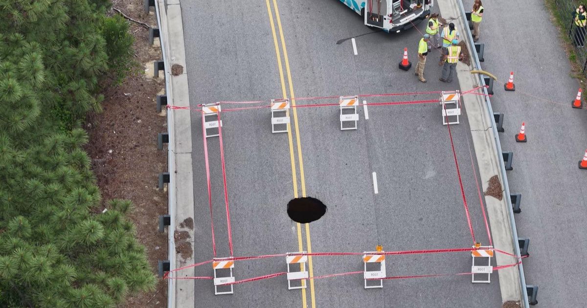 Large sinkhole blocks traffic on Yonkers Road in Raleigh :: WRAL.com