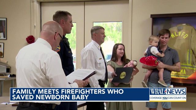 Family meets firefighters who saved newborn baby