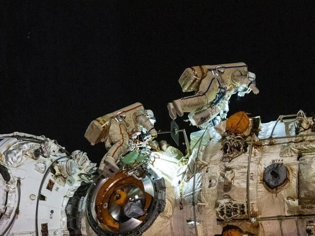 Russian cosmonauts to activate space station's new robotic arm