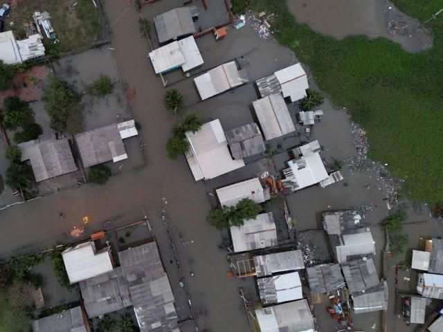Twelve dead and others missing as cyclone hits southern Brazil