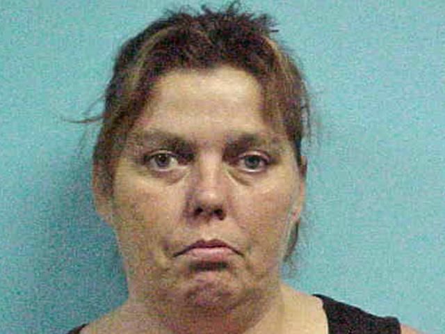 Woman charged with stealing rings from ex