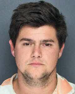 Man accused of breaking into gun, hardware stores