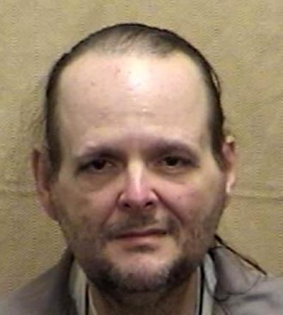 Man who held newspaper hostage dies in prison