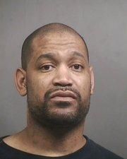 Son arrested in community leader's slaying