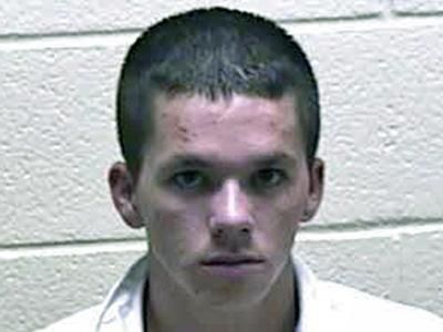 Firefighter charged with setting tire fire