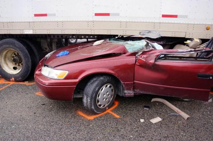 Driver survives after car goes under tractor-trailer in Aberdeen