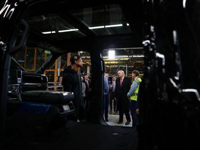 Trump appears to flip someone off at a Ford plant. The White House says ...