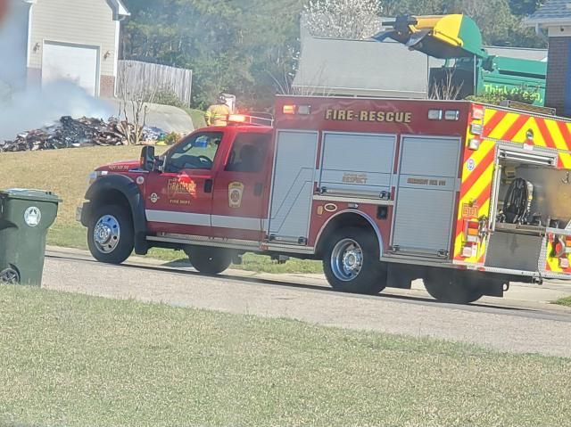Fayetteville residents report pile of garbage on fire in neighborhood