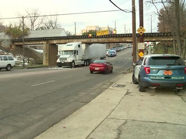 Not again: 18-wheeler becomes lodged under Peace Street bridge