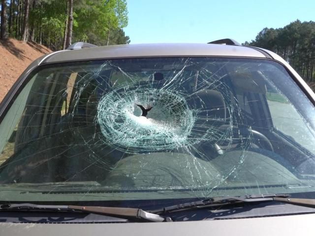 Loose pipe punctures SUV windshield on I-40