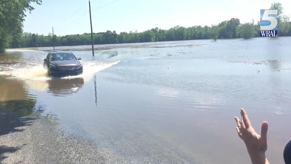 In Wilson County flood plain, water blocks roads