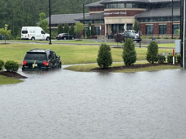 Stranded cars, flooded roads after heavy rain along NC coast
